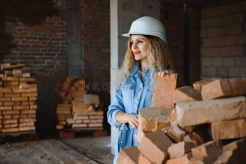 Woman with Brick in Construction Concept Stock Image - Image of brick ...