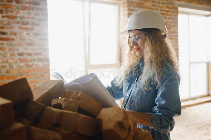 Woman with Brick in Construction Concept Stock Image - Image of ...