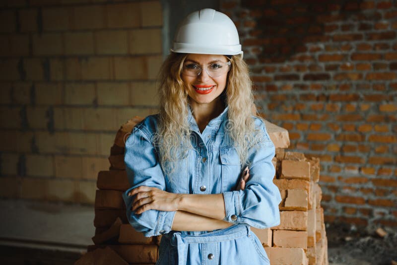 Woman with Brick in Construction Concept Stock Photo - Image of ...