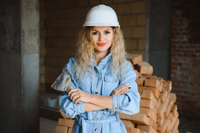 Woman with Brick in Construction Concept Stock Photo - Image of worker ...