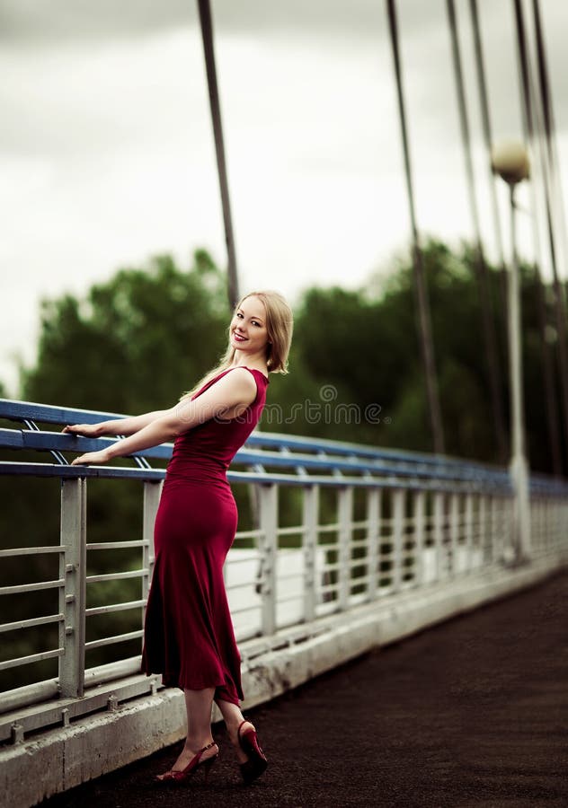 Woman on Bridge stock photo. Image of leaves, woman - 101515274
