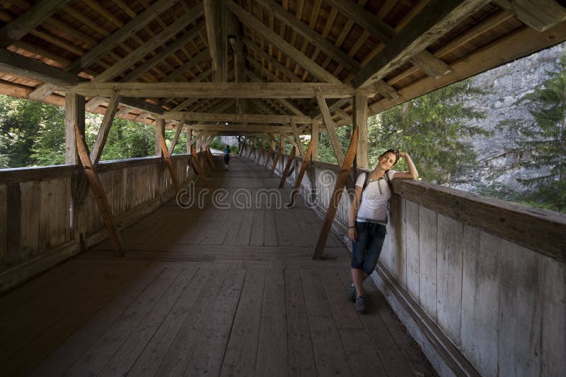 A woman on a bridge stock photo. Image of roof, woman - 41304242