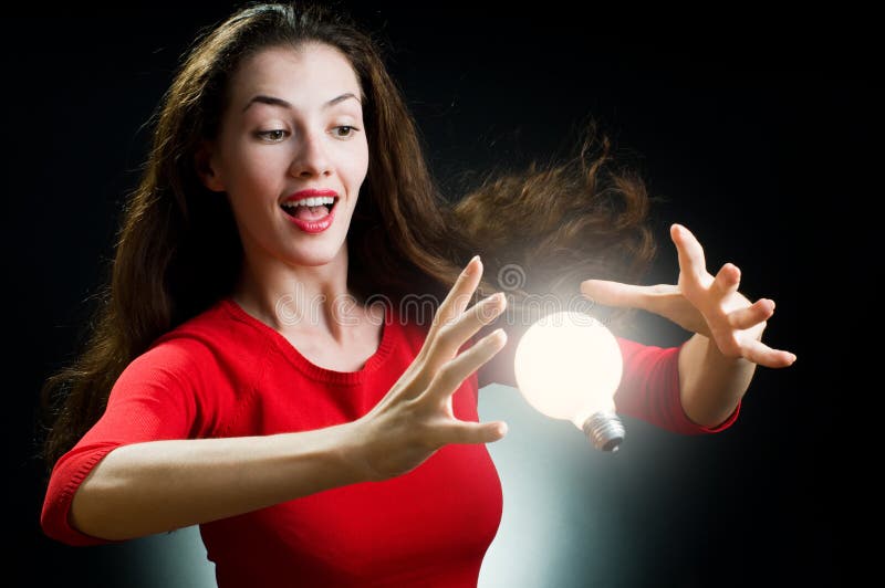 Woman and Bright Light Bulb Stock Photo - Image of glowing, power: 6376944