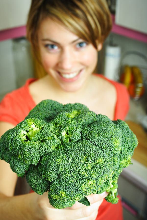 Woman with broccoli stock image. Image of fresh, healthy - 12734955