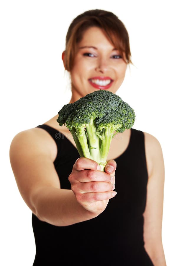 Woman with broccoli stock photo. Image of nice, hold - 24641350