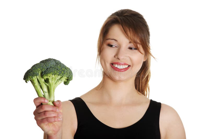 Woman with broccoli stock photo. Image of eating, natural - 24741942
