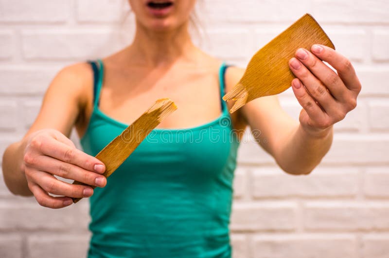 Woman with a Broken Kitchen Wooden Spatula Stock Photo - Image of ...