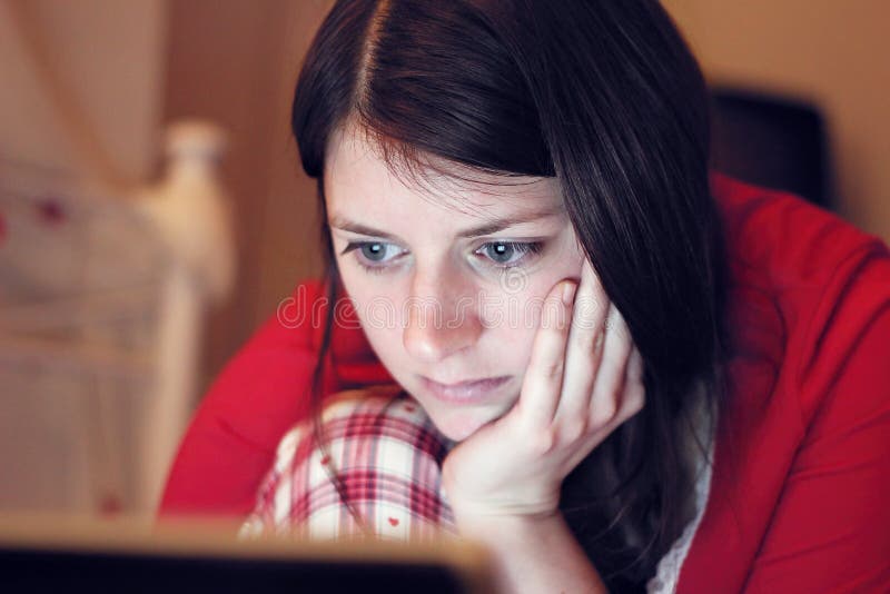 Woman Browsing Internet on Laptop Computer. Screen Illuminated Face ...