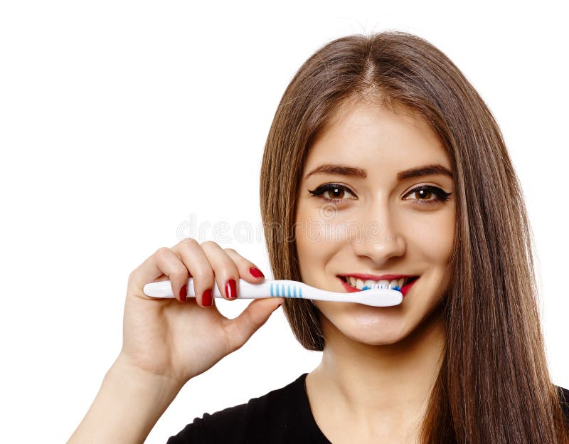 Woman brushing her teeth stock photo. Image of cleansing - 38804238