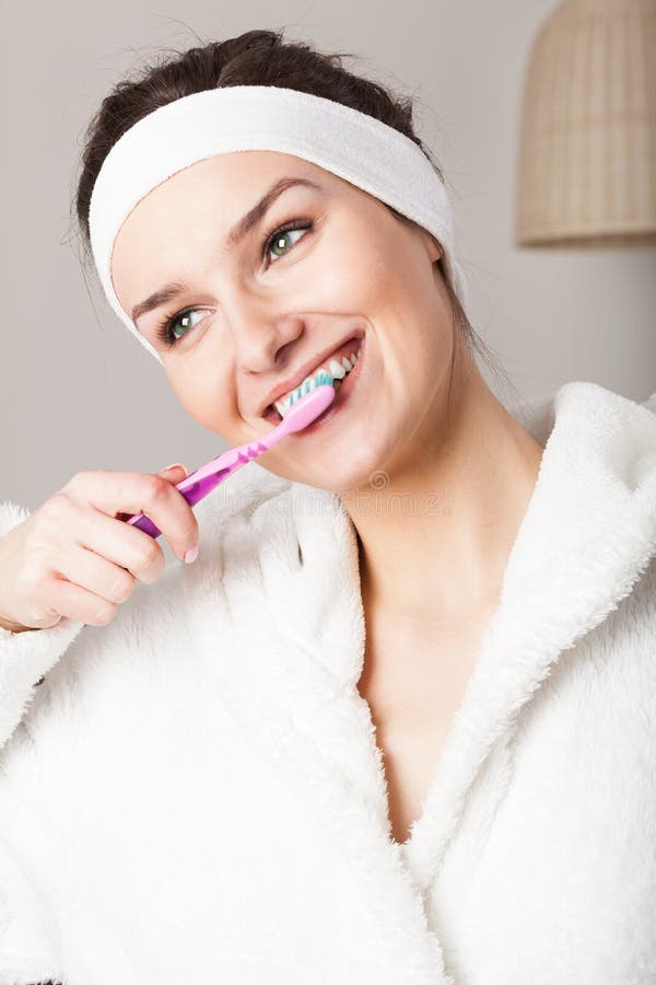 Woman brushing teeth stock photo. Image of pretty, freshness - 39177888