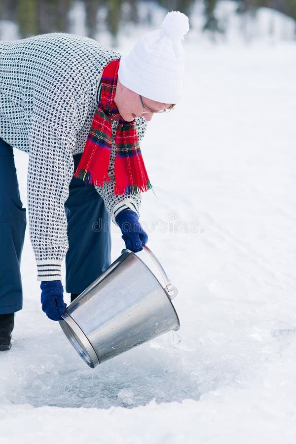 Woman and bucket stock photo. Image of household, person - 24340788