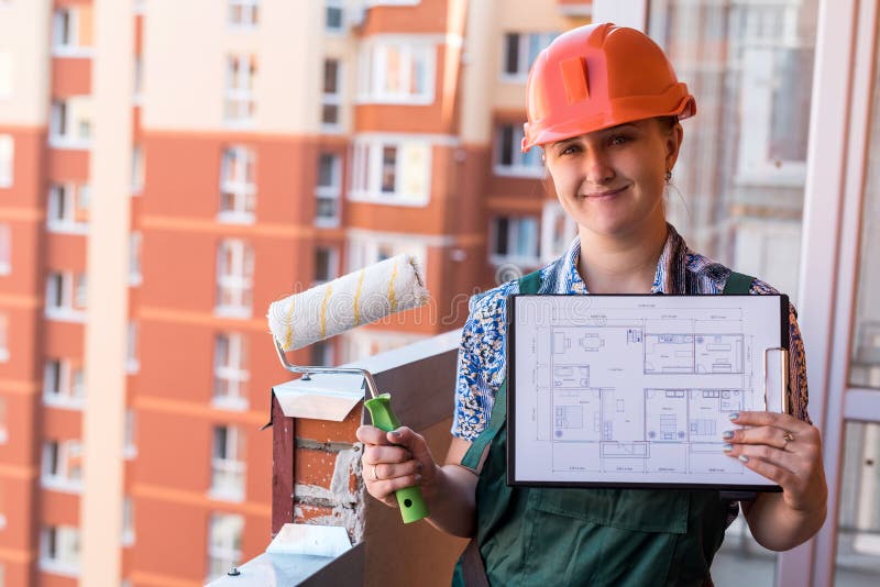 Woman Builder with Apartment Plan Posing on Balcony Stock Photo - Image ...