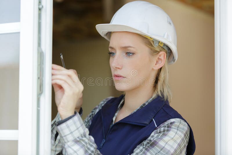 Woman Builder Fixing Window Stock Image - Image of woman, concept ...