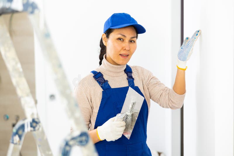 Woman Builder with Floated Trowel Stock Image - Image of thai, coverall ...