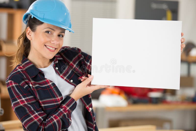 Woman Builder Holding White Banner Stock Photo - Image of person ...