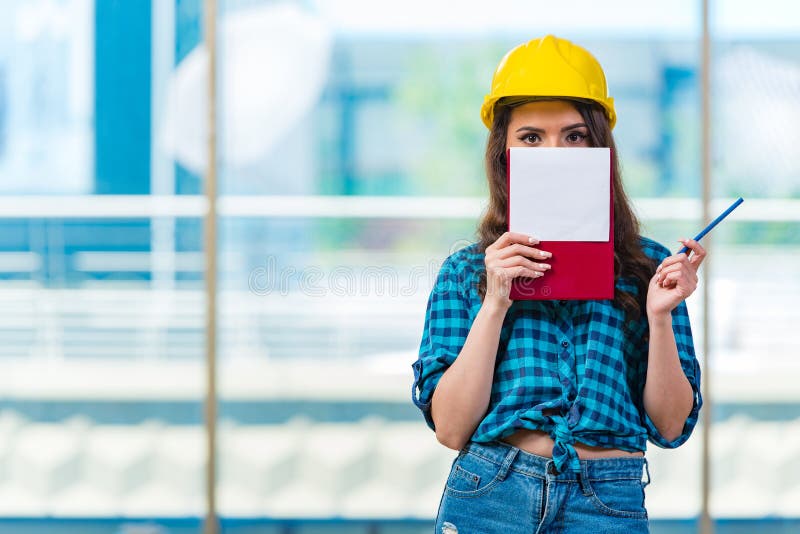 The Woman Builder Taking Notes at Construction Site Stock Photo - Image ...