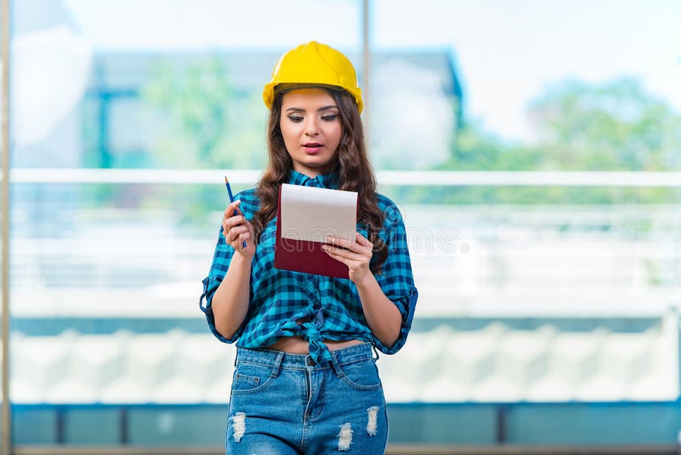 The Woman Builder Taking Notes at Construction Site Stock Photo - Image ...