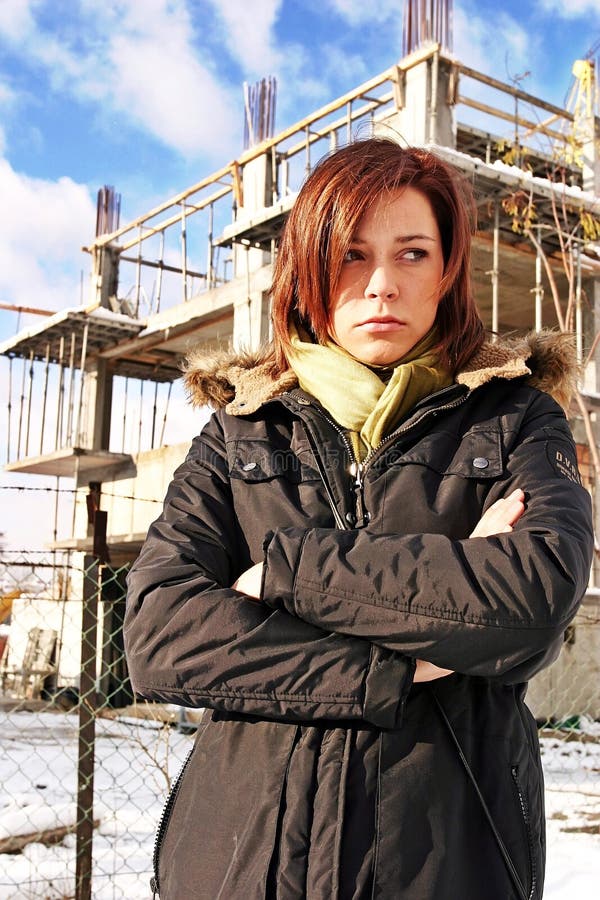 Woman at a building stock photo. Image of construction - 1331448