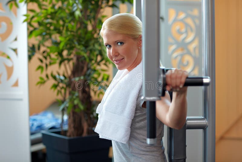 Woman on a Butterfly Machine Stock Image - Image of athletic, face ...
