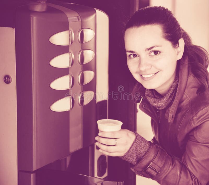 Woman Buying Coffee from Automatic Machine Stock Photo - Image of ...