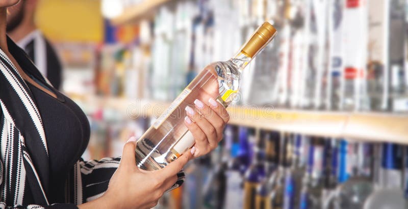 Woman Buying Vodka at Supermarket Stock Photo - Image of people, vodka ...