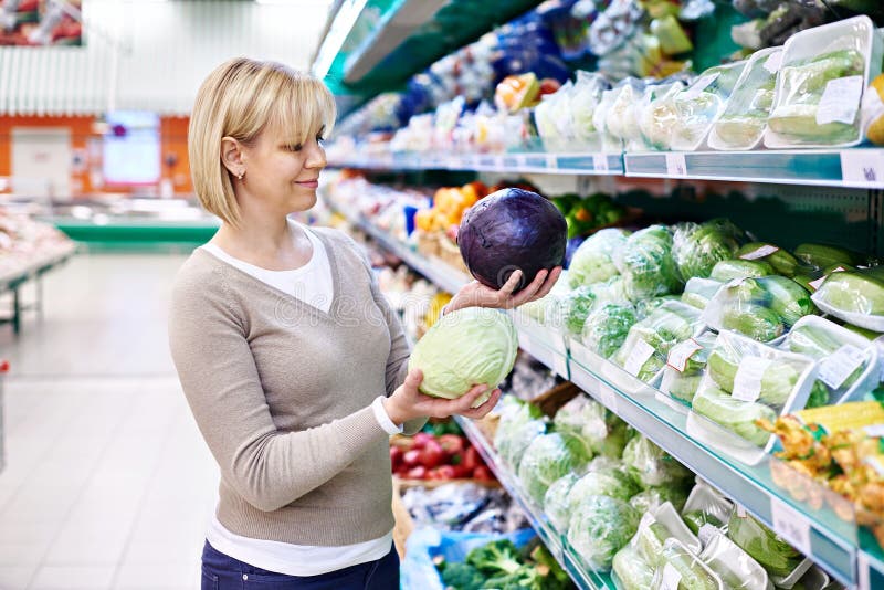Woman Buys a Red and White Cabbage in Store Stock Image - Image of buys ...