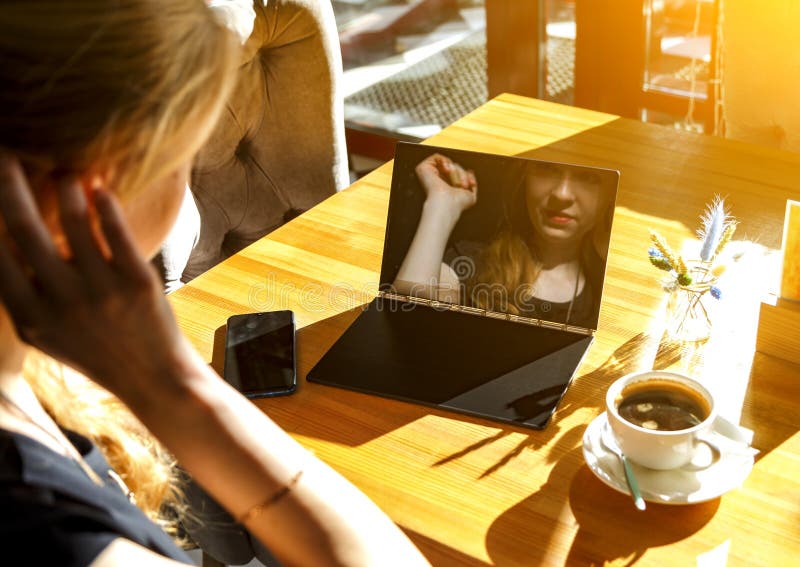 Woman at the Cafeteria Using Technology, Reflection of the Girl& X27;s ...