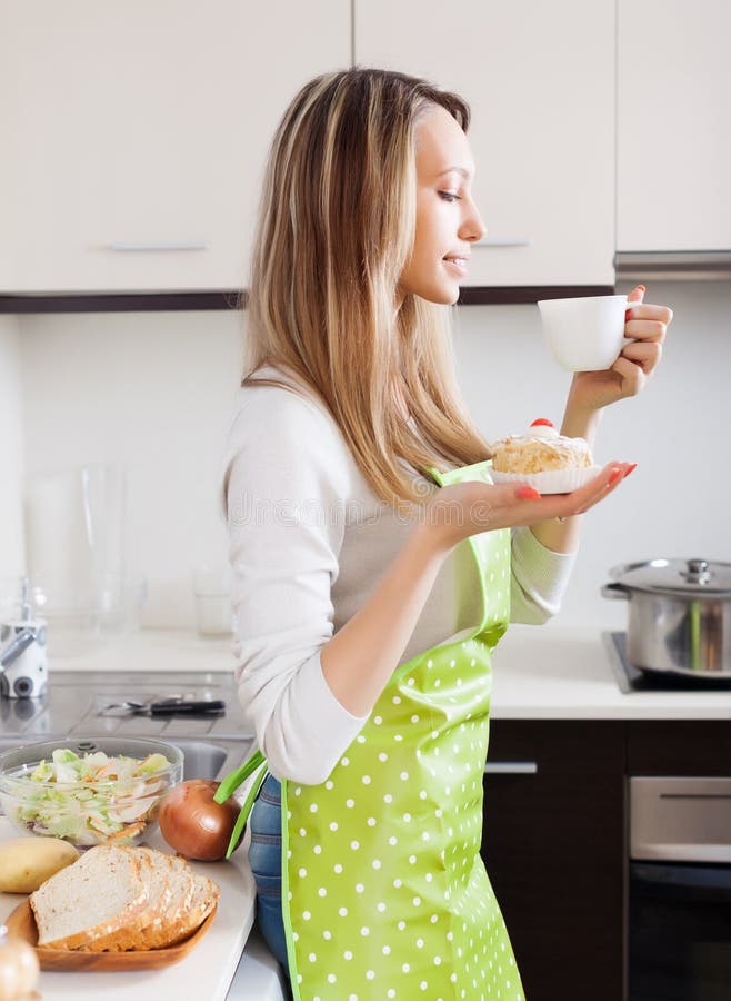 Woman with Cakes and Tea in Kitchen Stock Photo - Image of chocolate ...
