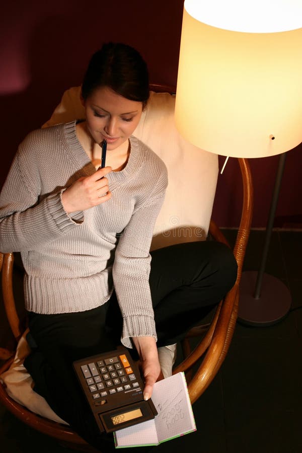 Woman with calculator stock photo. Image of woman, personal - 1688636