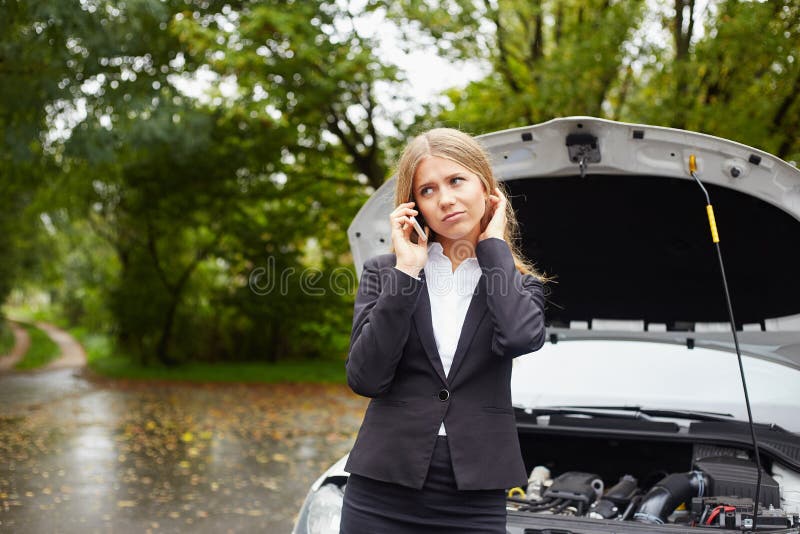 Woman with a Broken Car Calling for Assistance Stock Photo - Image of ...