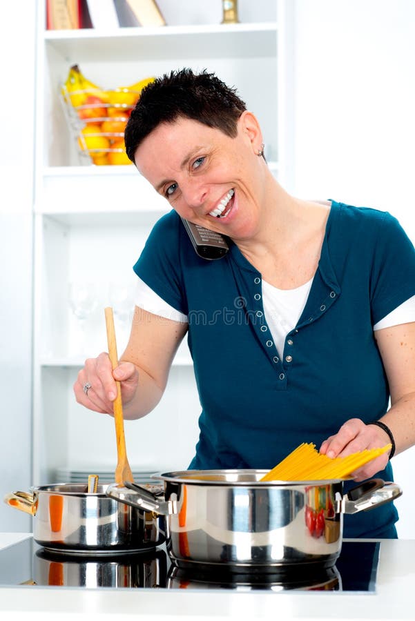 Woman is Calling and Cooking Stock Photo - Image of book, delicious ...