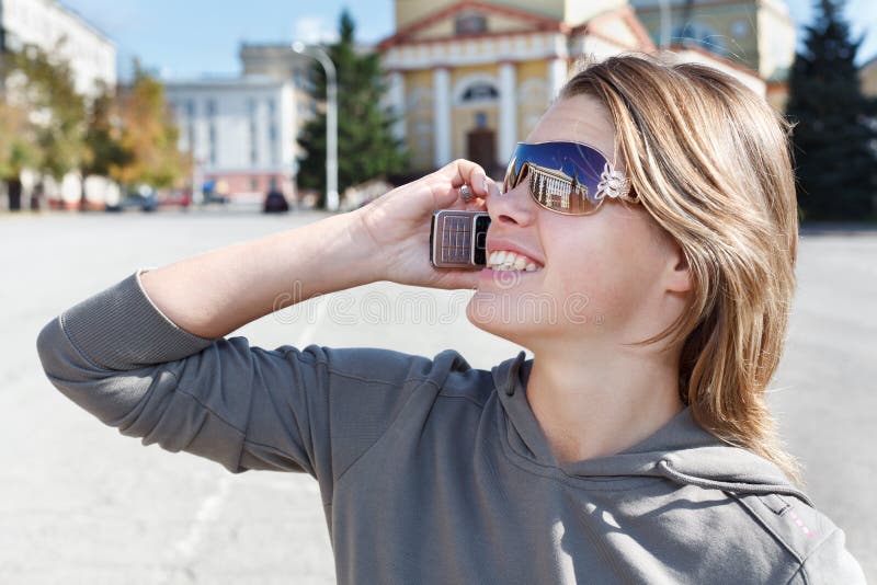 Woman calling by phone stock image. Image of attractive - 21562777