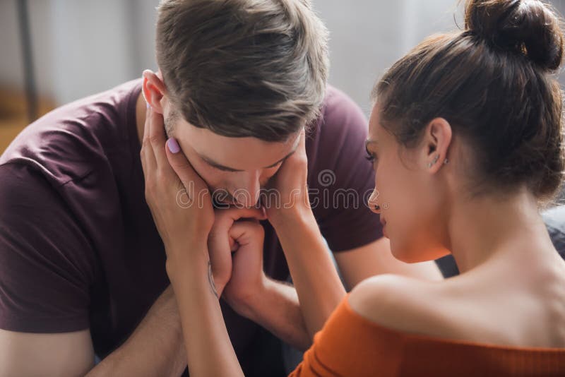 Woman Calming Sad Man By Touching Stock Image Image Of Adult