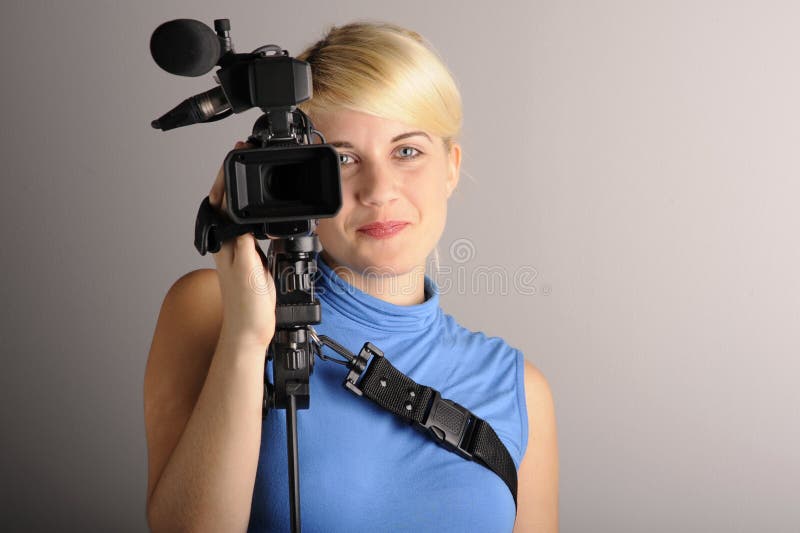 Woman with camera stock photo. Image of blond, education - 7149358