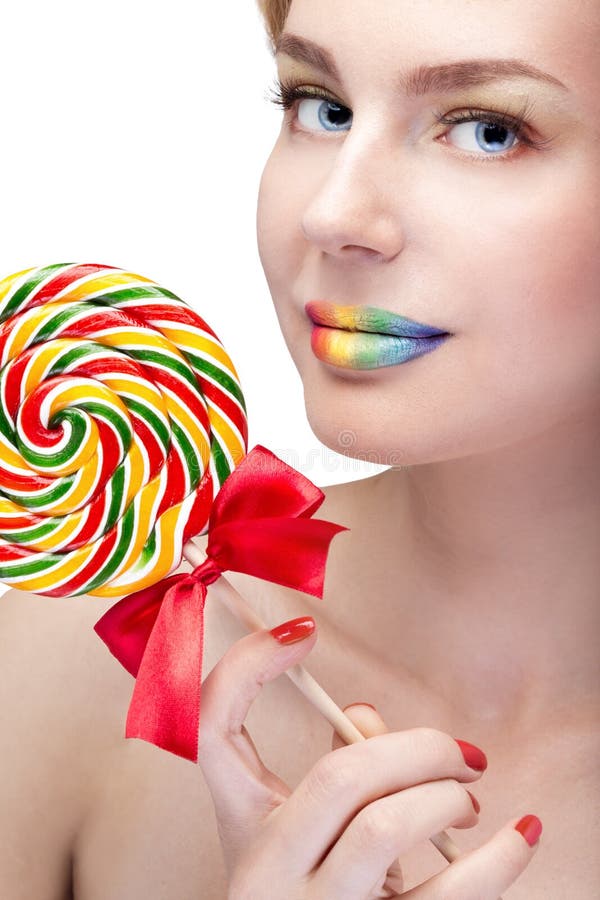 Woman with candy stock image. Image of lollypop, girl - 35334847