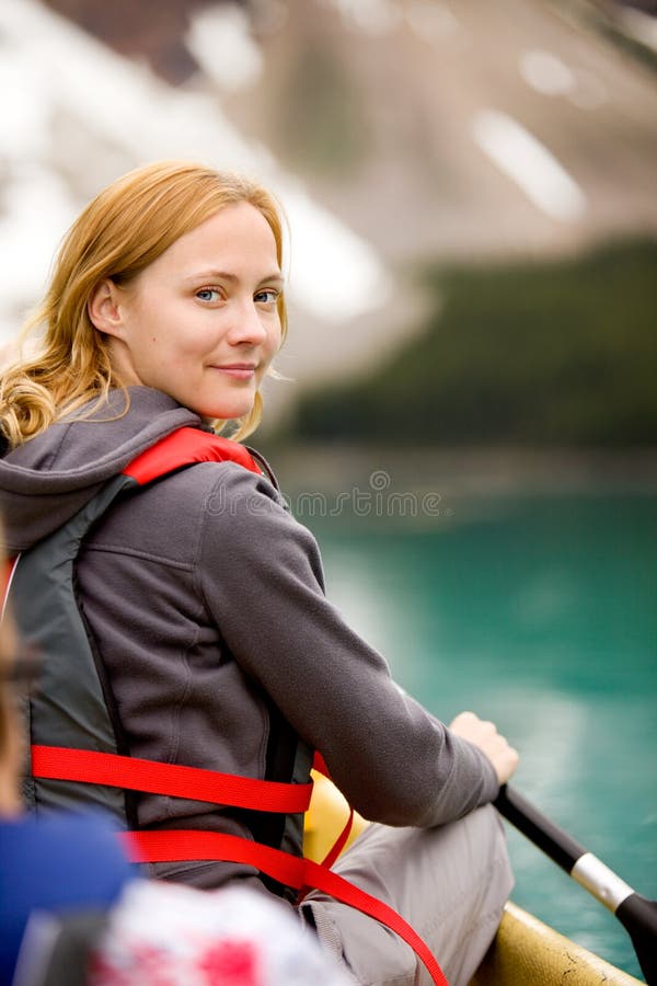Woman in Canoe stock image. Image of paddle, caucasian - 16590553