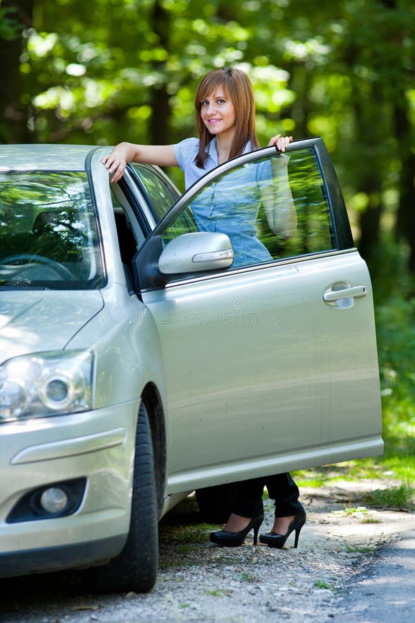 Woman with car stock image. Image of girl, attention - 15297999