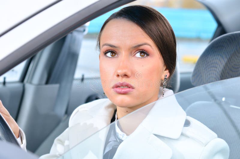 Woman in a Car is Looking Upwards Stock Image - Image of beauty, driver ...