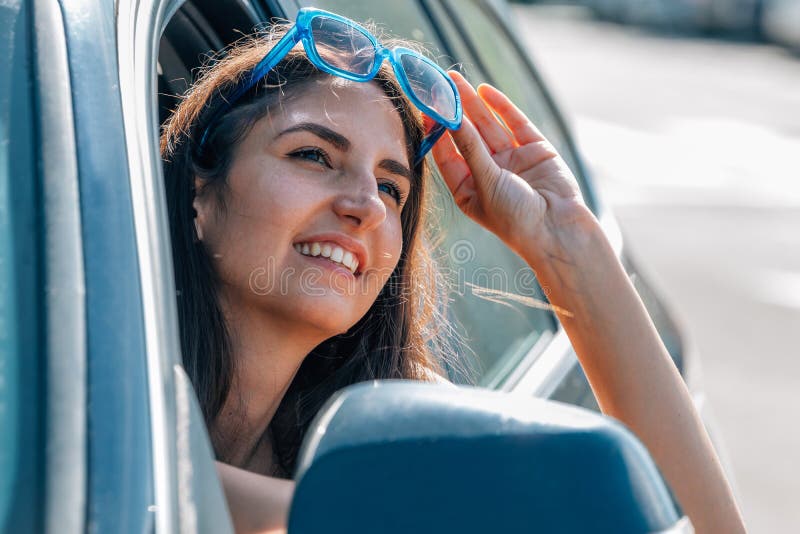 Woman in car window stock image. Image of lifestyle - 250044861