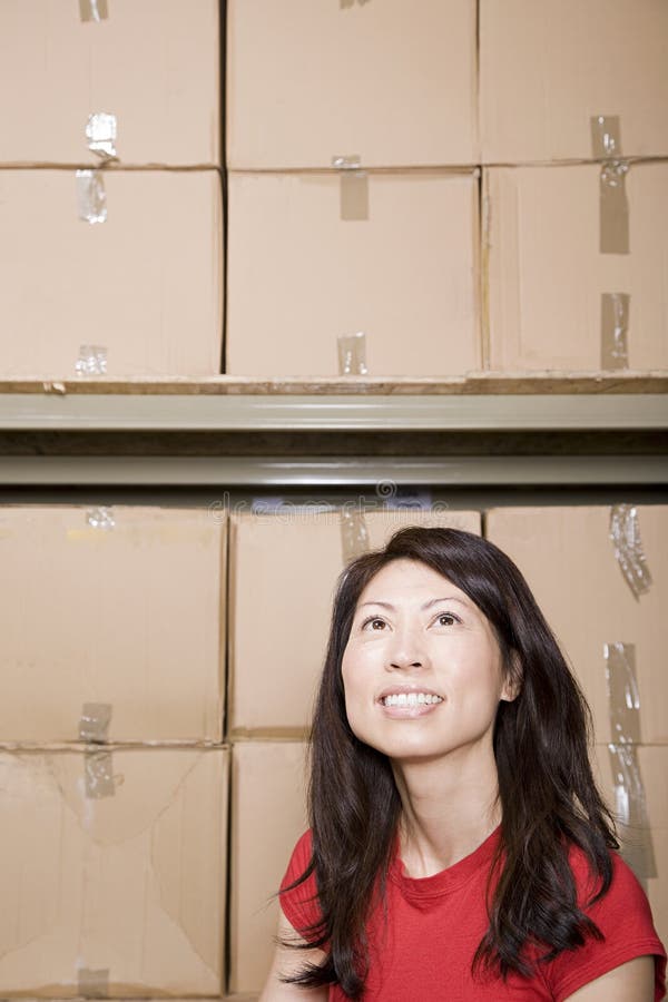Woman and cardboard boxes stock image. Image of condition - 62806107