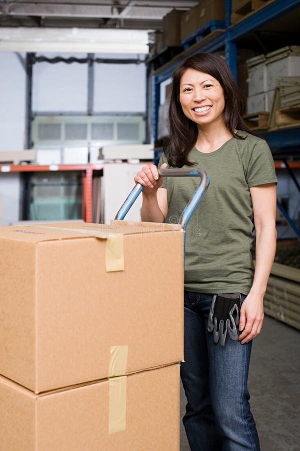 Woman with cardboard boxes stock image. Image of chinese - 62806177