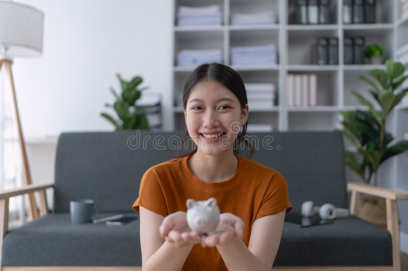 Woman Carefully Develops a Financial Saving Plan, Organizing Her ...