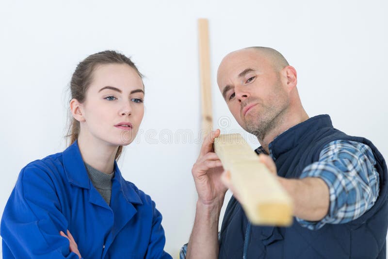 Carpenter and Apprentice in Workshop Stock Image - Image of carpentry ...