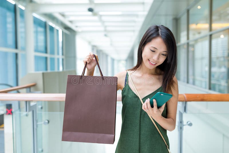 Woman Carry with Shopping Bag and Using Mobile Phone Stock Image ...
