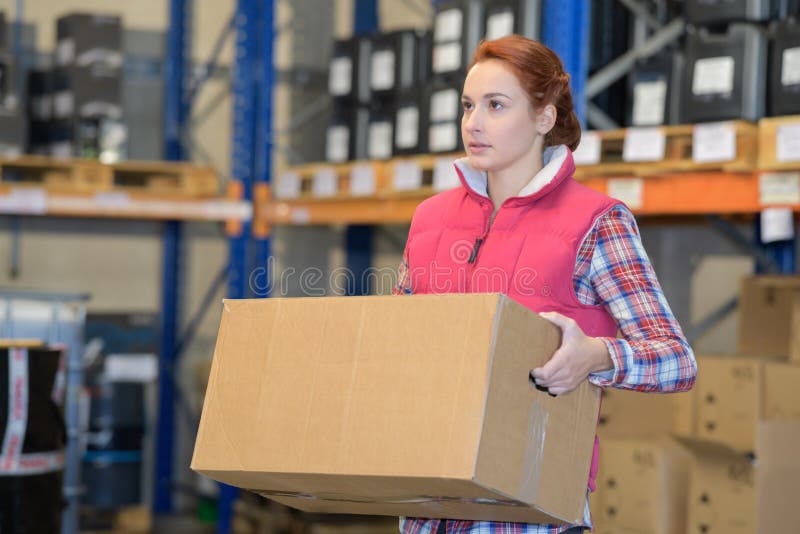 Woman carrying box stock image. Image of material, package - 266082311