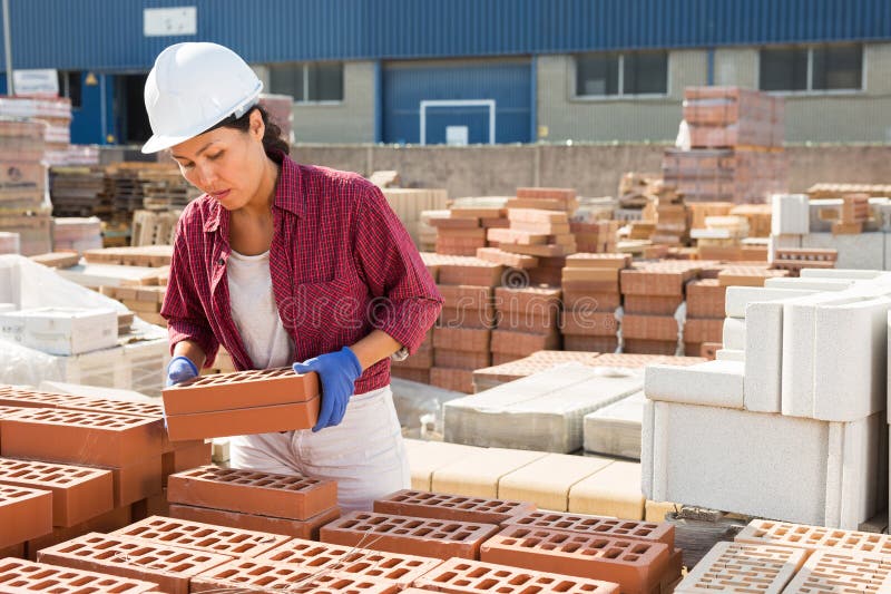 Woman Carrying Clay Bricks in Outdoor Storage Stock Photo - Image of ...
