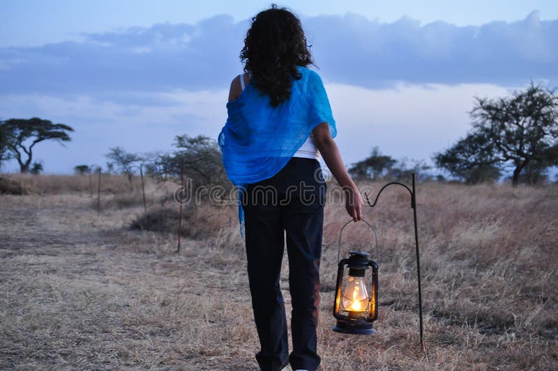 Woman carrying lamp stock photo. Image of nature, chandelier - 42446400