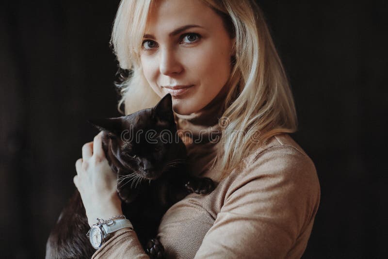 Woman with cat stock image. Image of cute, little, girl - 137421603