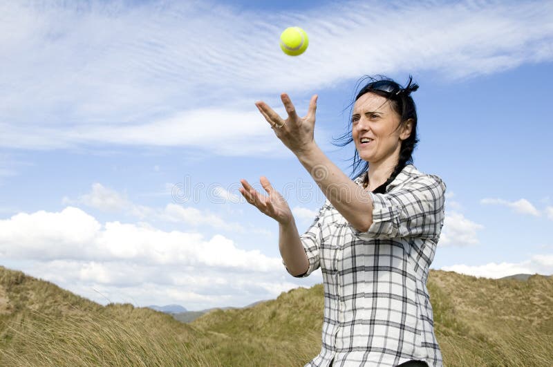 Woman Catching Ball Stock Photography - Image: 24720152