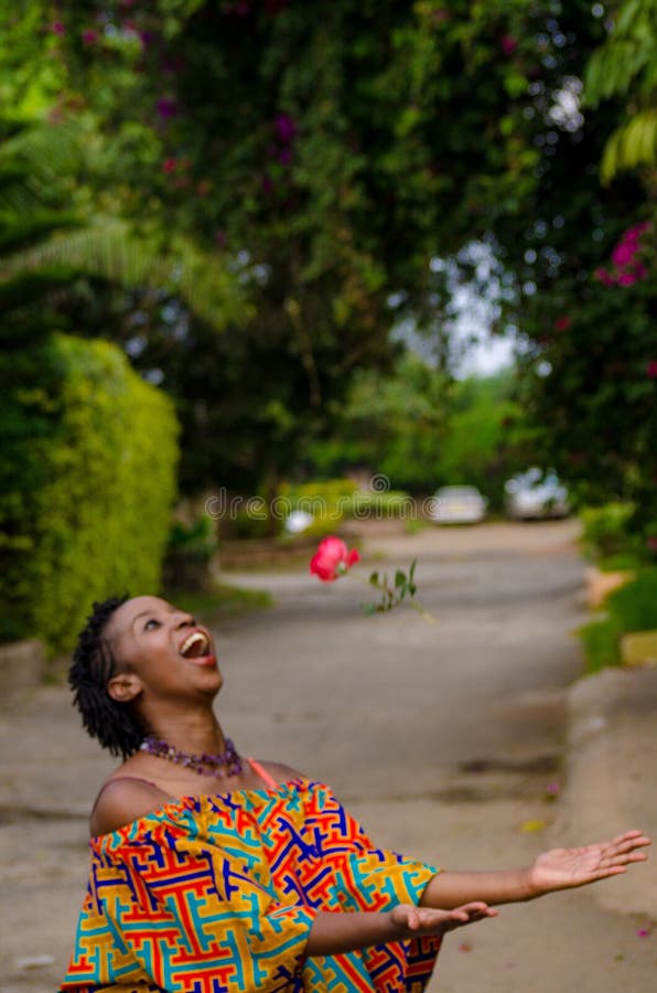 Woman Catching Pink Flwoer Picture. Image: 116050073
